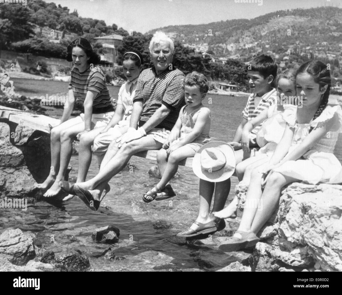 Actor Charlie Chaplin with his family on vacation in France Stock Photo ...