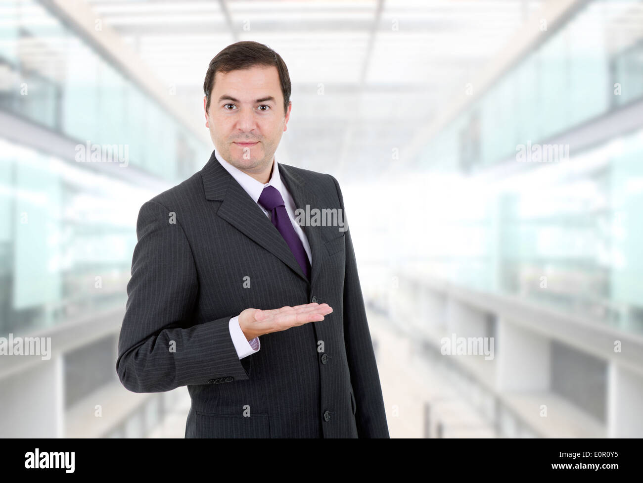 businessman showing is hand at the office Stock Photo - Alamy