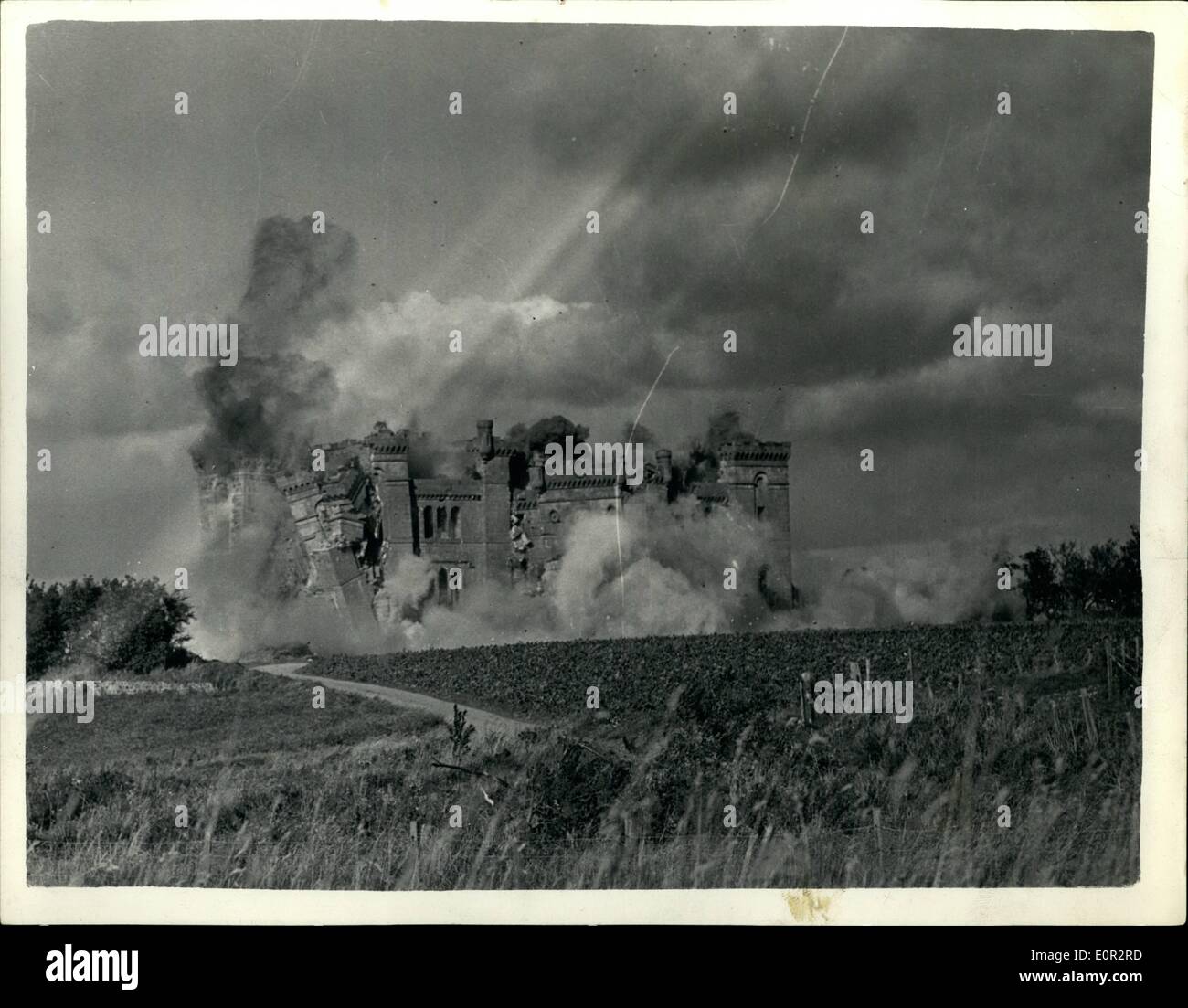 Oct. 10, 1957 - Ancient castle goes up in smoke. Blown up by 500 LBS ...