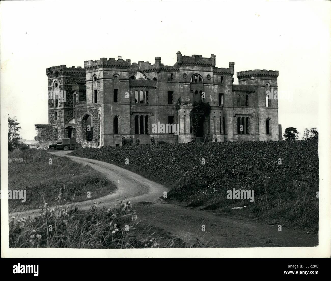 Oct. 10, 1957 - Ancient castle goes up in smoke. Blown up by 500 LBS ...