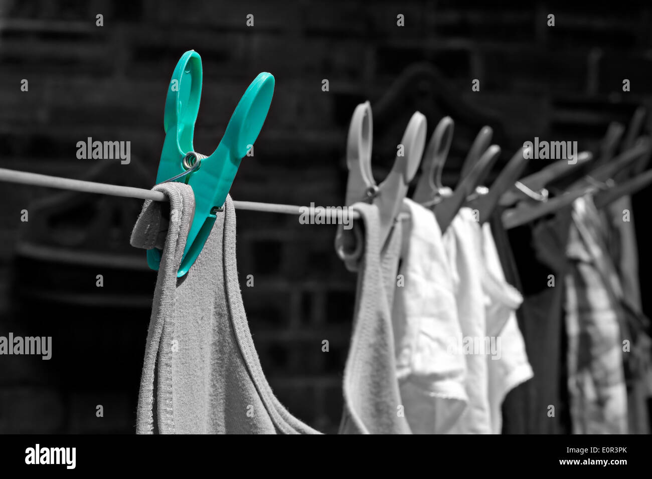 Washing line of clothes, (selective color Stock Photo - Alamy