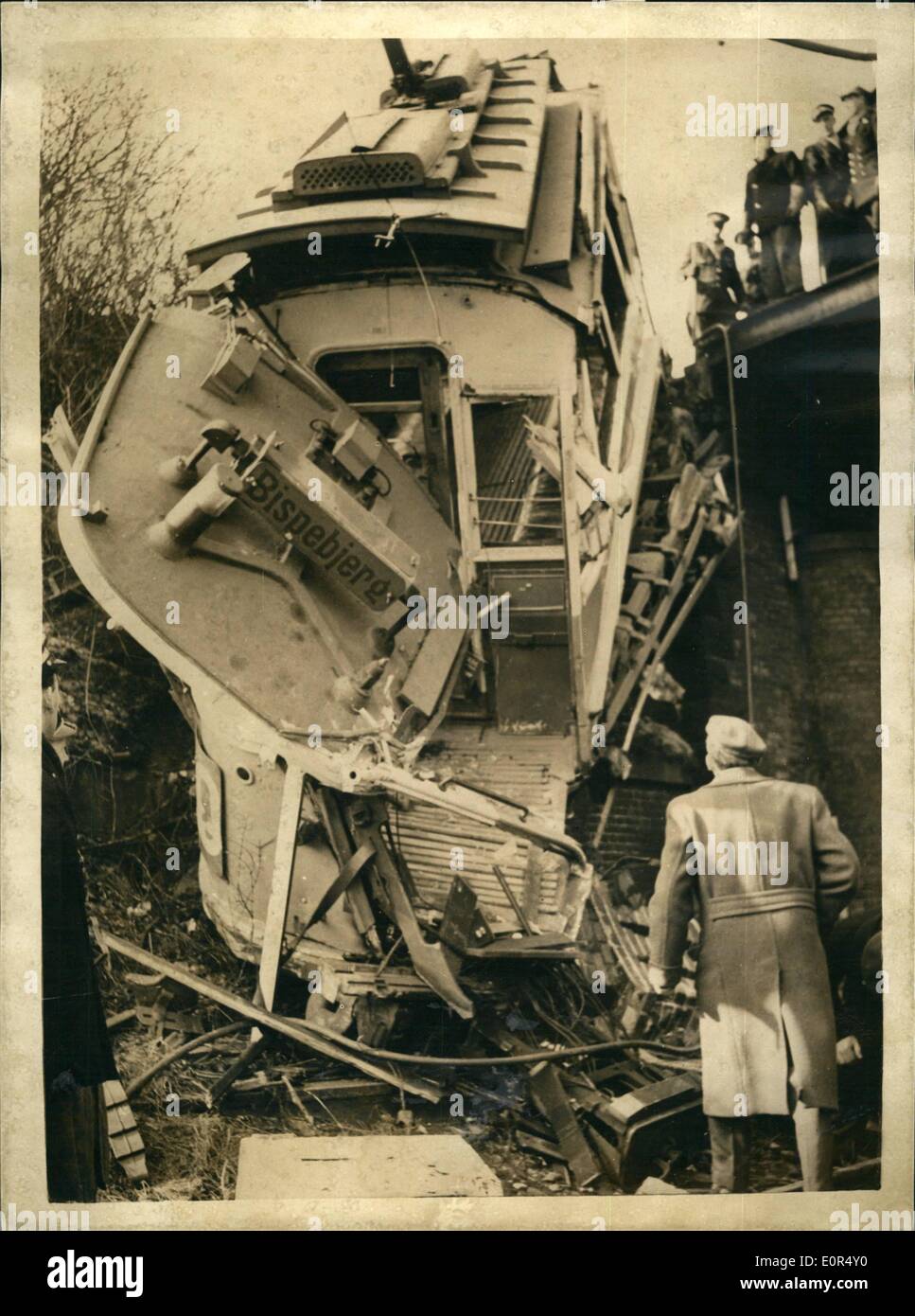 Mar. 03, 1958 - ESCAPE FOR TRAM PASSENGERS. A tram which left the rails ...