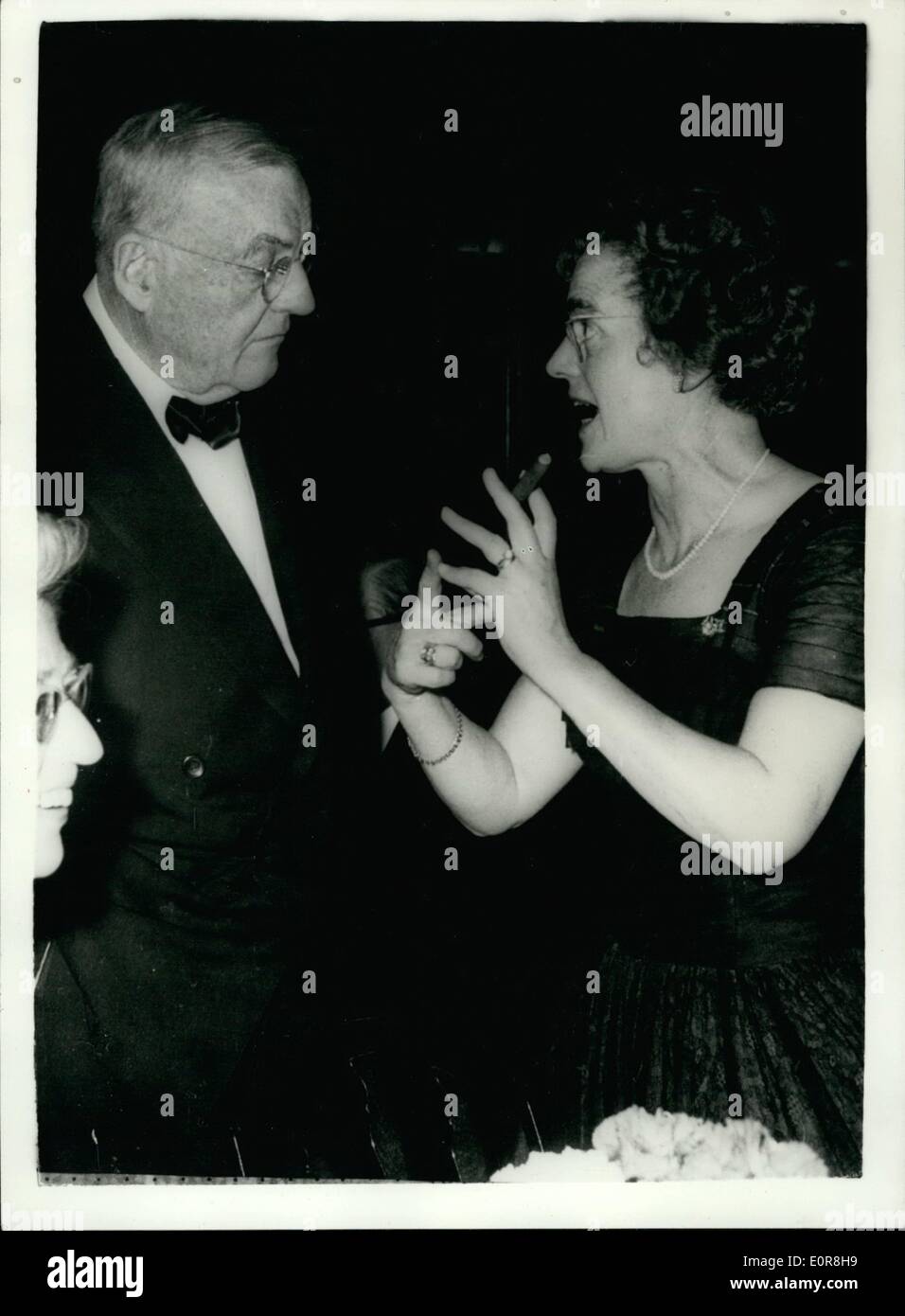 Jul. 07, 1958 - Denmark's female secretary of church enjoys a cigar ...