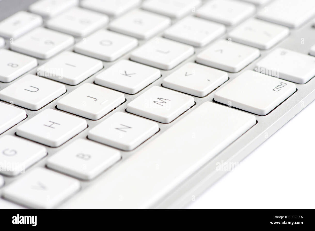 Apple mac white Keyboard focused on the letter M Stock Photo - Alamy