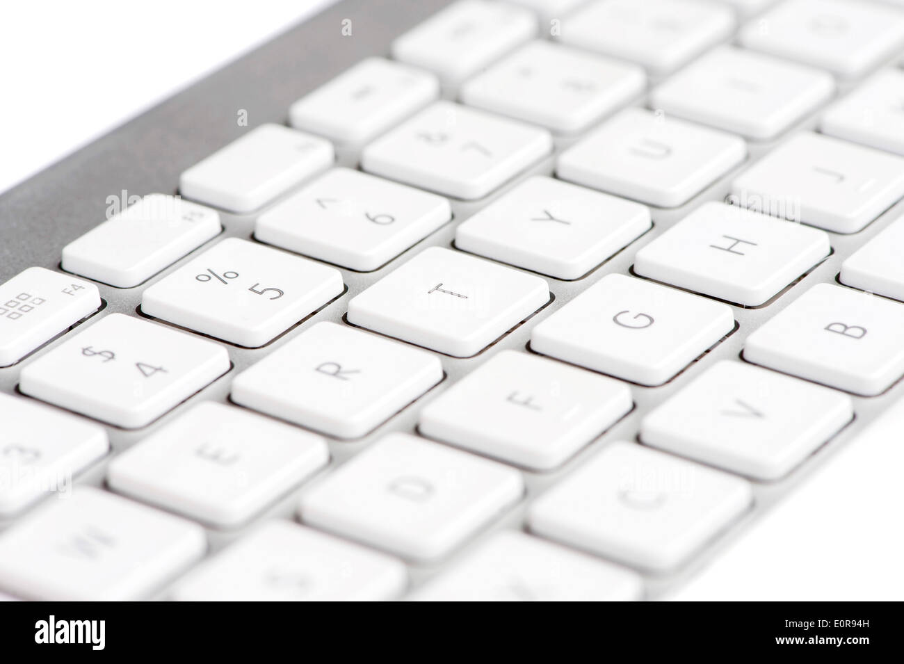Apple mac white Keyboard focused on the letter T Stock Photo - Alamy