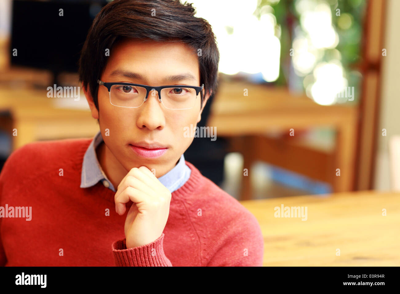 Young asian male student sitting in classroom Stock Photo - Alamy