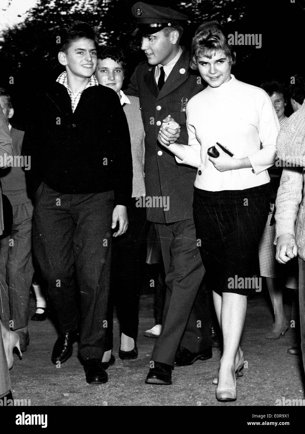 Elvis Presley in uniform with girlfriend Margrit Buergin Stock Photo ...