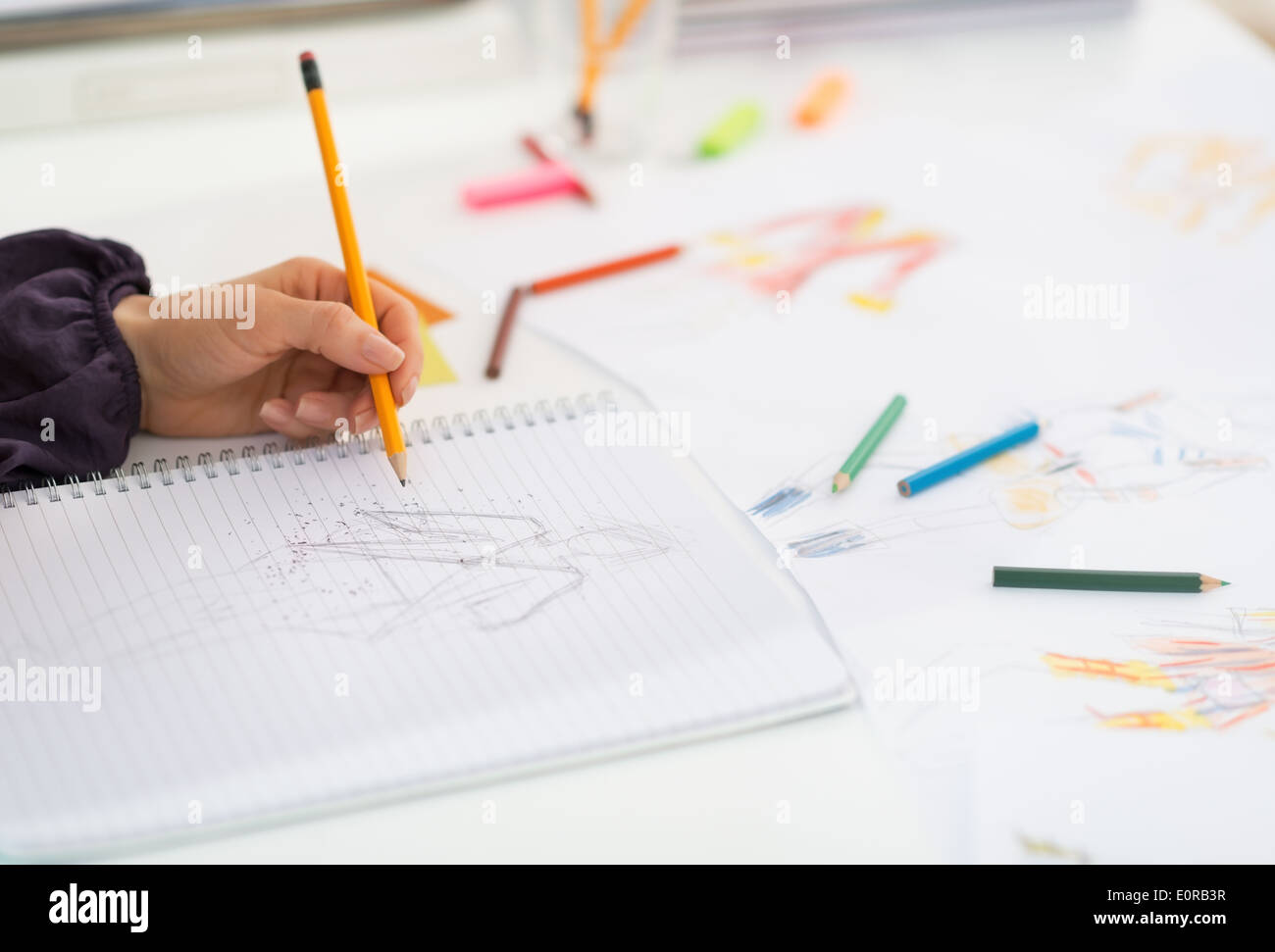 Closeup on fashion designer working in office Stock Photo - Alamy