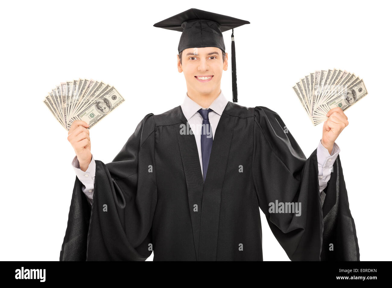 Male graduate student holding money Stock Photo - Alamy