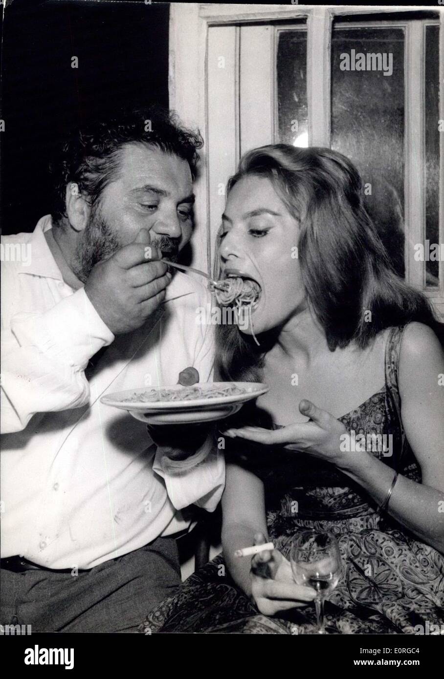 Jul. 04, 1959 - Folco Lulli teaches Belinda Lee how to eat Spaghetti ...