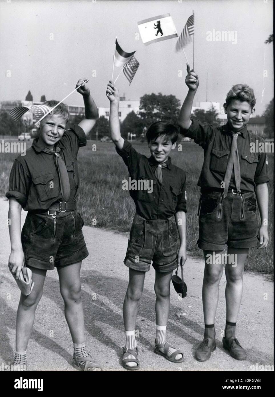 Aug. 24, 1959 - These boy scouts are waving the Stars and Strips, the ...