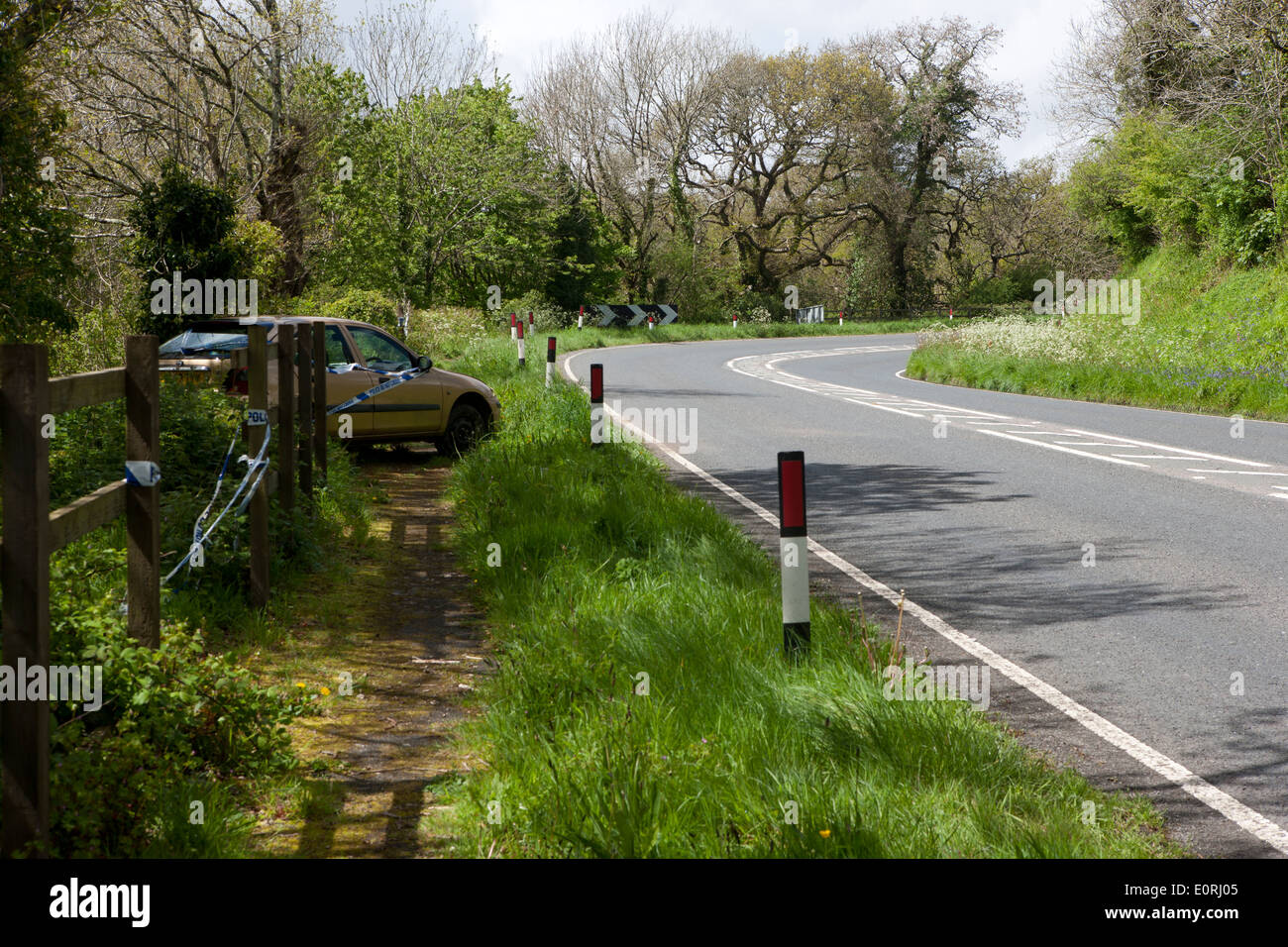 A crashed Rover 25 car beside the A374 road at Trerule Foot near ...