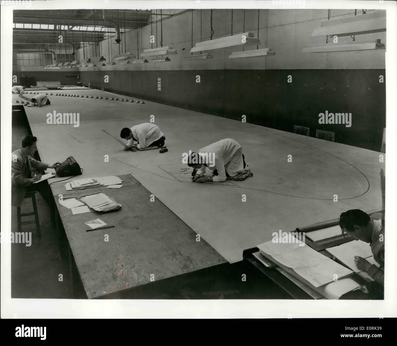 Dec. 12, 1959 - Table top task: From left to right, on their hands and ...