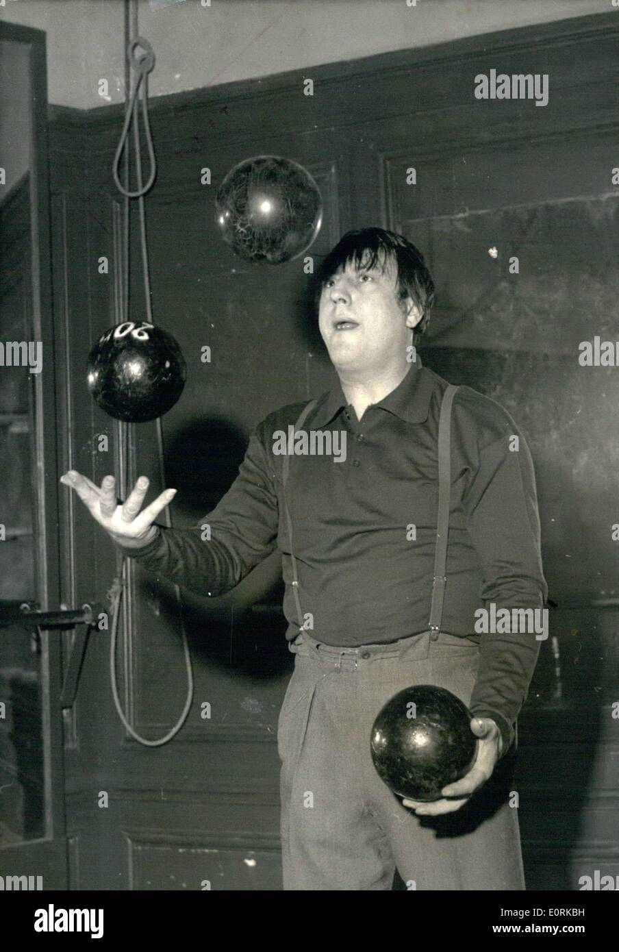 Dec. 12, 1959 - Juggling with weights: Photo Shows Raymond Devos, the ...