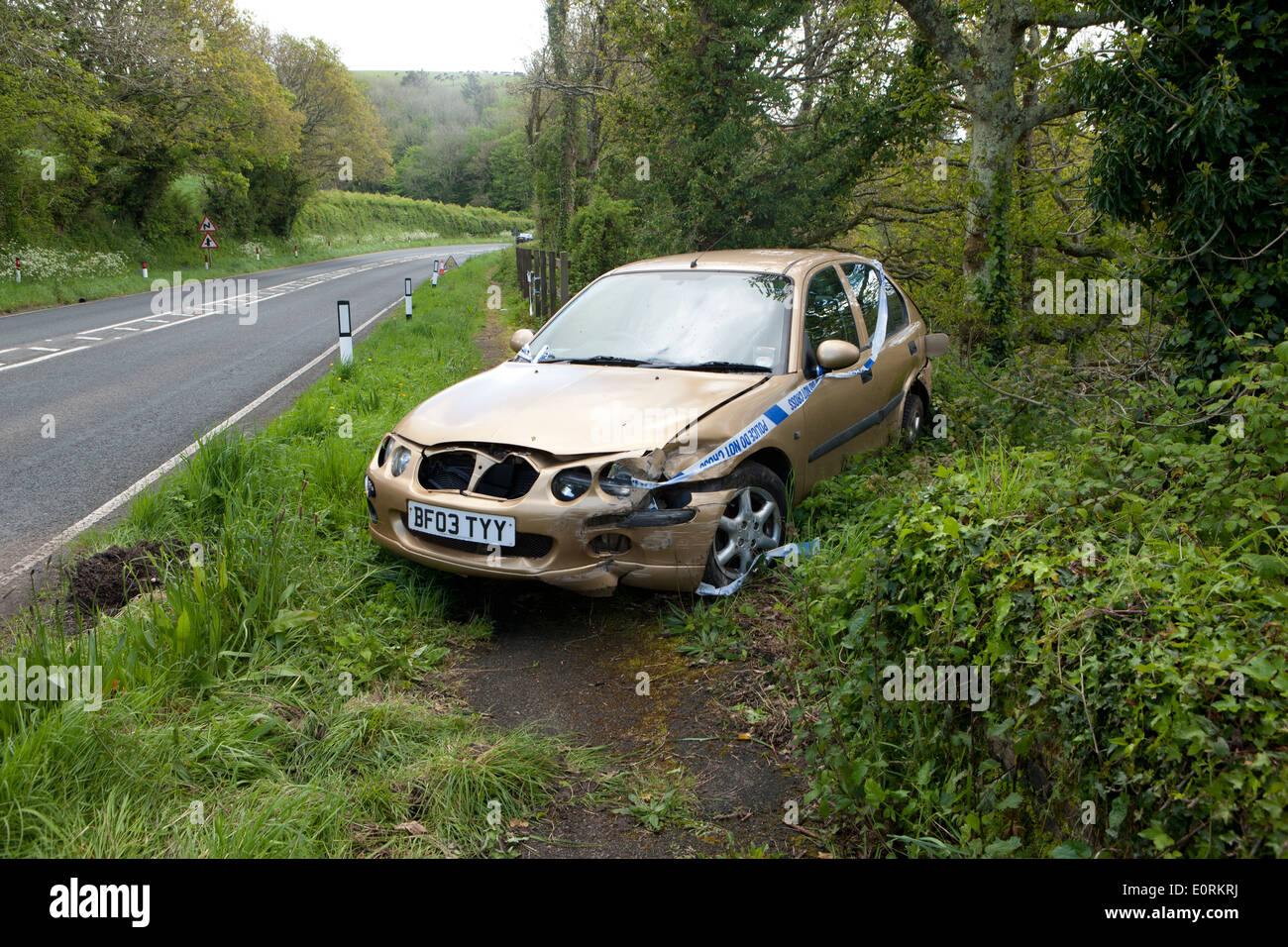 A crashed Rover 25 car beside the A374 road at Trerule Foot near ...