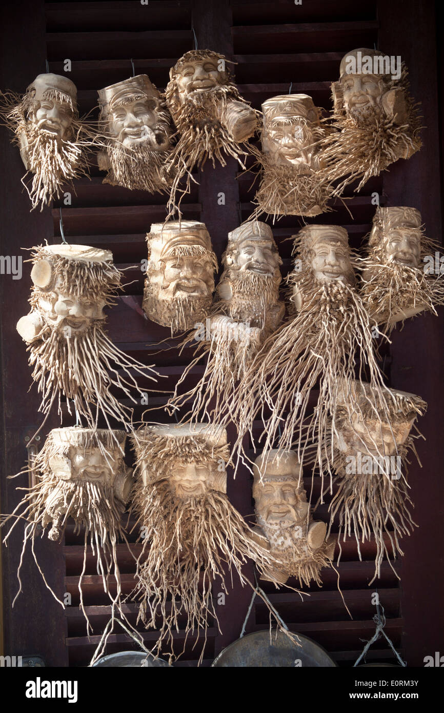 Carved Tree Roots on sale in Hoi An Vietnam Stock Photo - Alamy