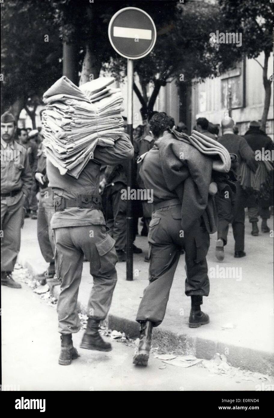 Jan. 28, 1960 - Revolt In Algiers OPS:- Insurgents carrying a pile of ...