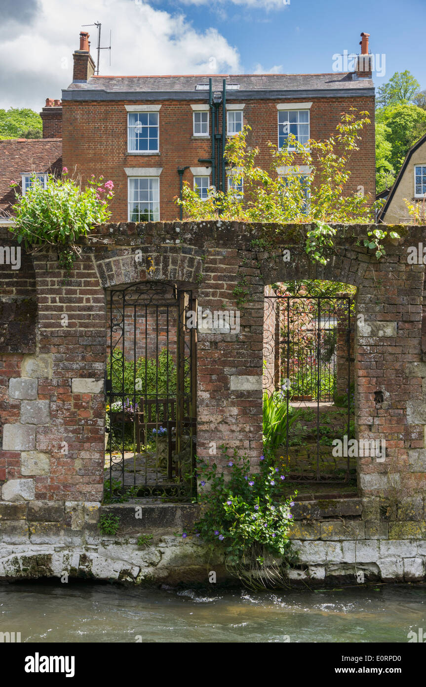 Two garden gates onto the river from adjoining Georgian houses, England ...