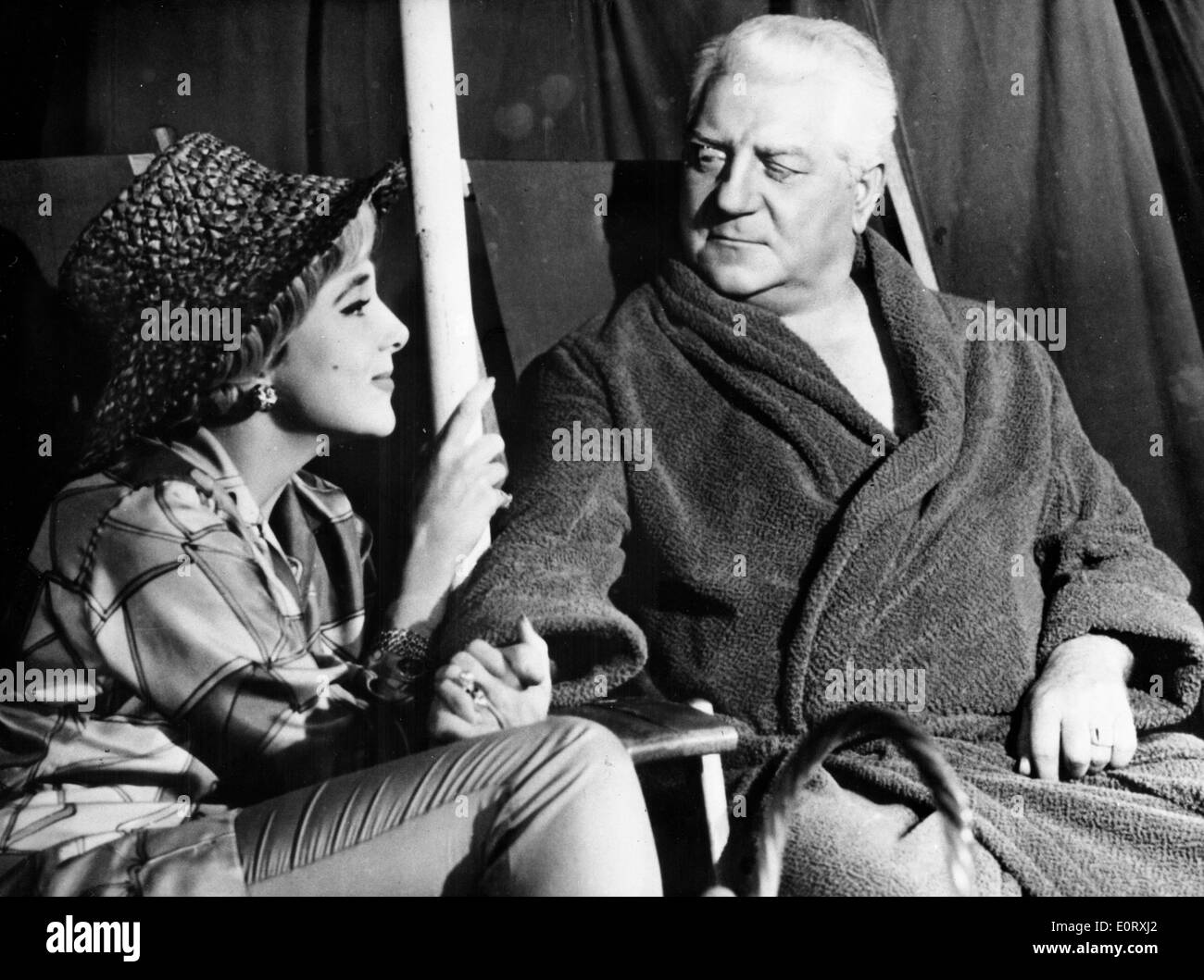 Actor Jean Gabin and an actress co-star in film Stock Photo - Alamy