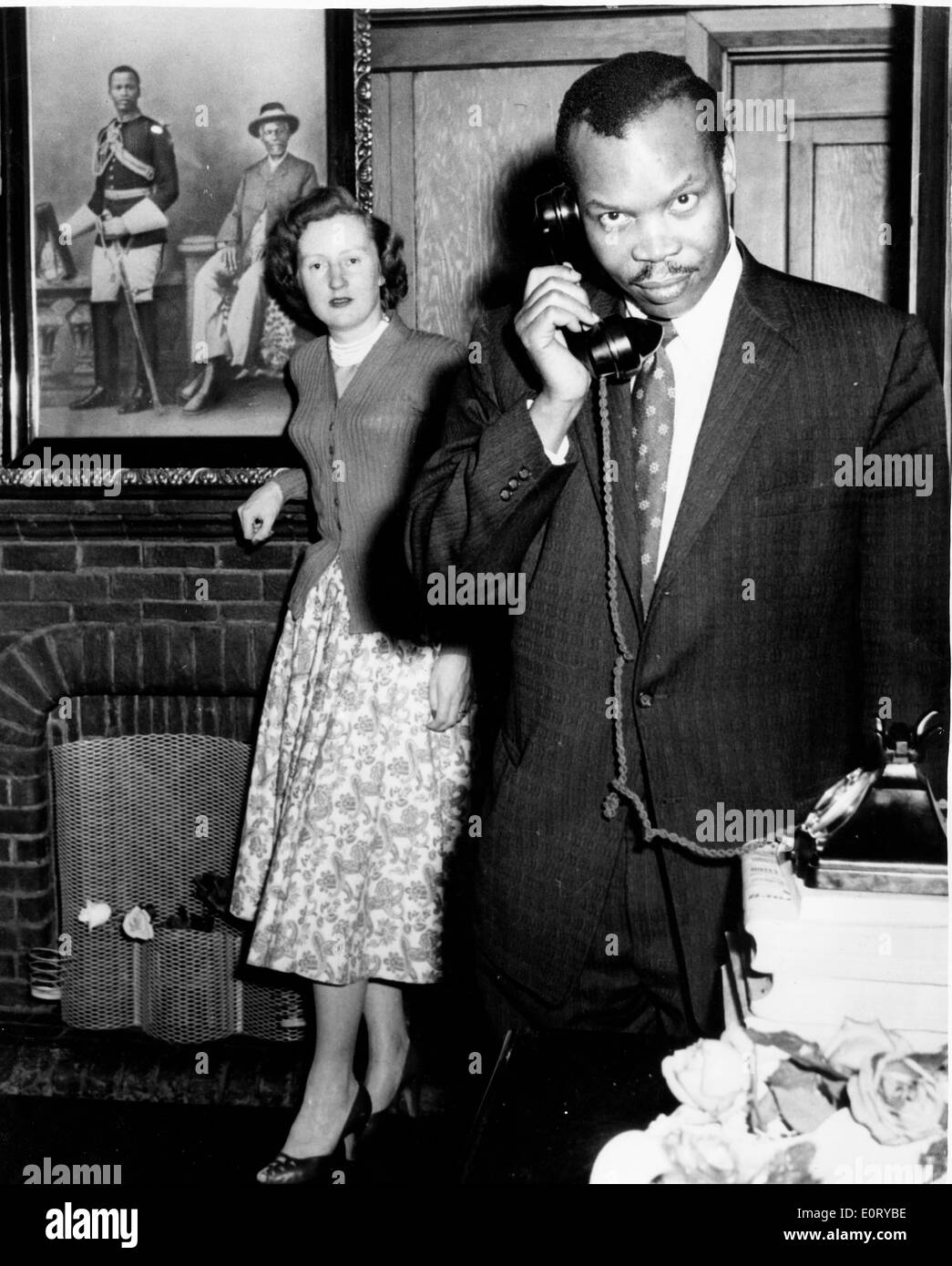 First president of Botswana SERETSE KHAMA, right, makes a telephone ...