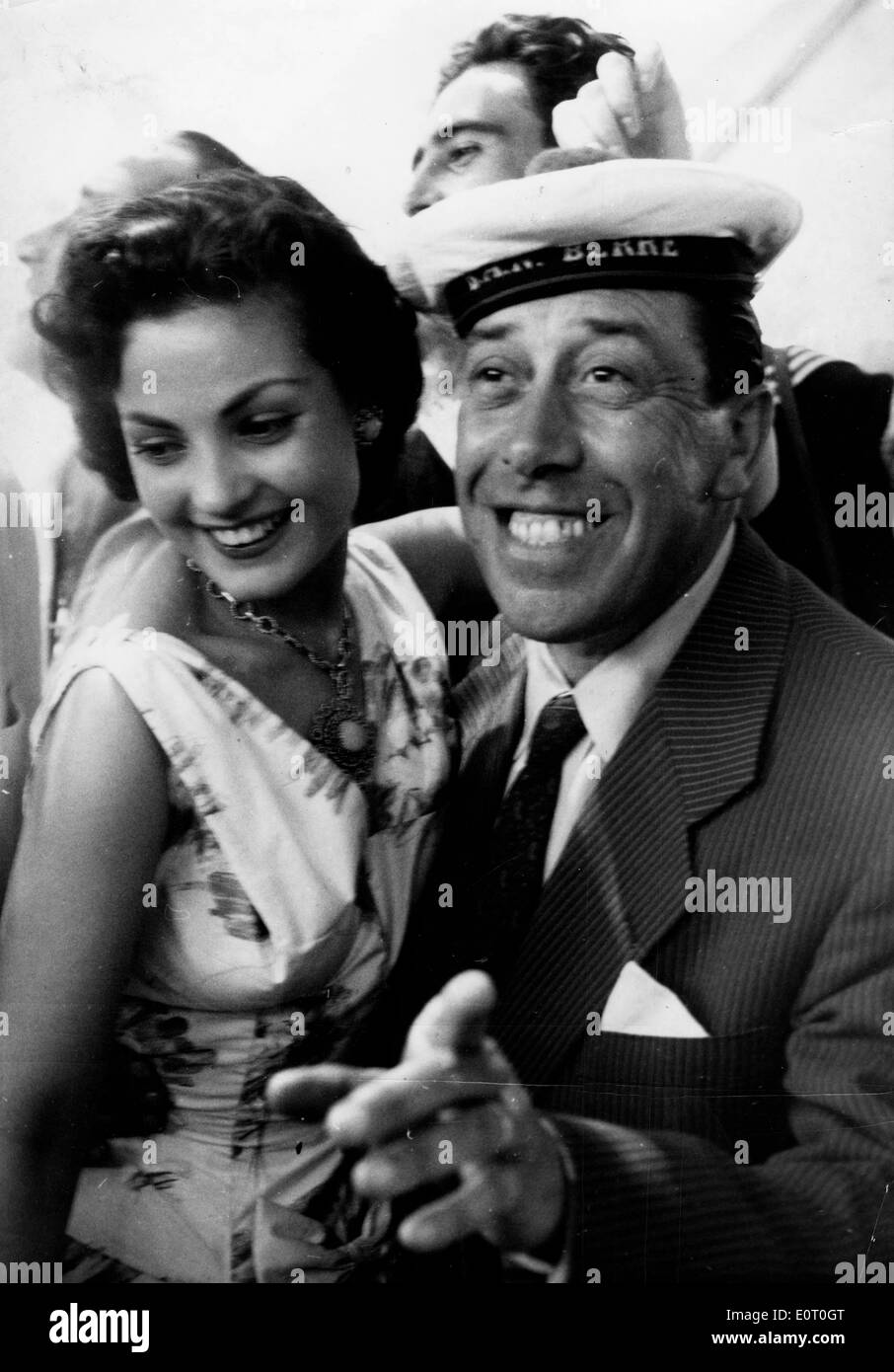 Actor Fernandel dances with co-star in film scene Stock Photo - Alamy