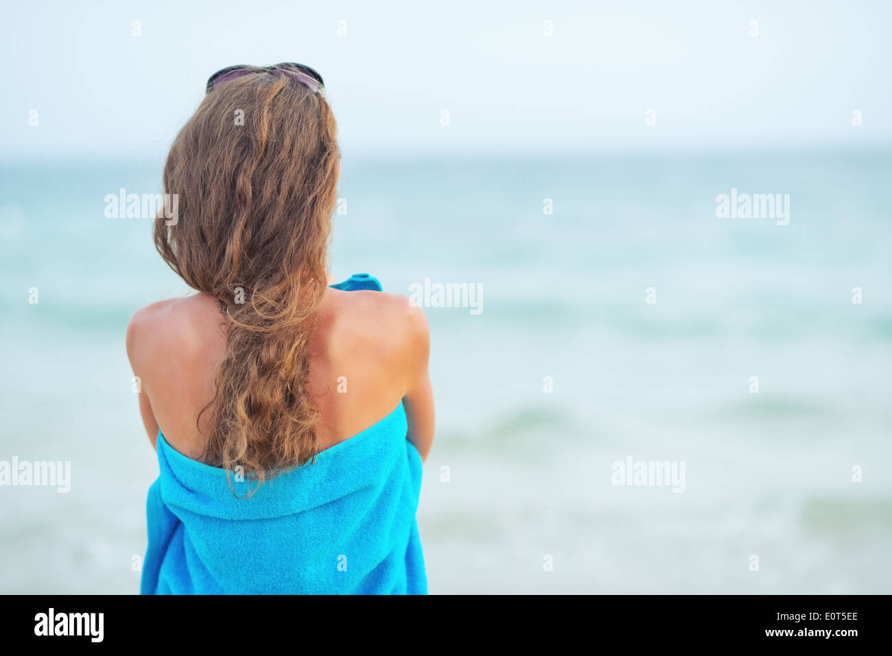Back view young woman looking distance hi-res stock photography and ...