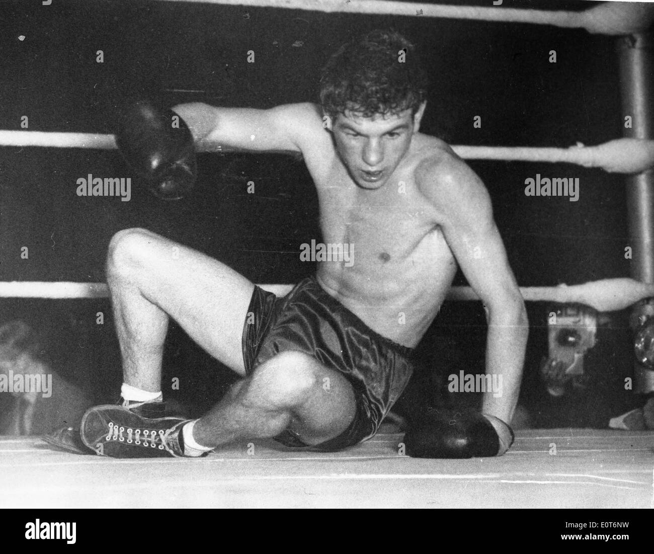 Boxer Dai Dower on the ground during a match Stock Photo - Alamy