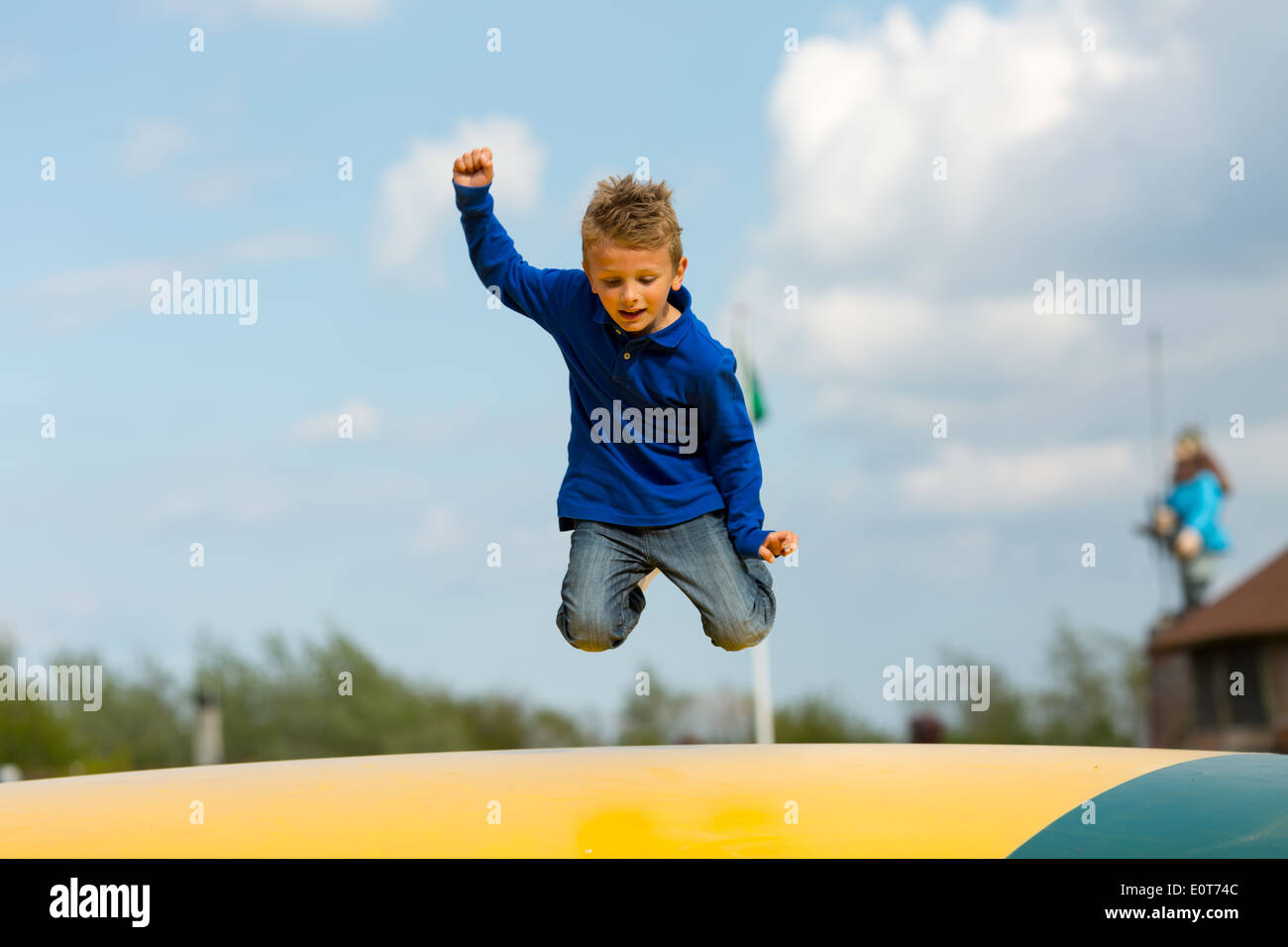 Kids jumping up and down hi-res stock photography and images - Alamy