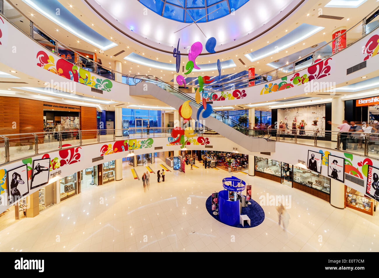 interior of shopping mall with people walking Stock Photo - Alamy