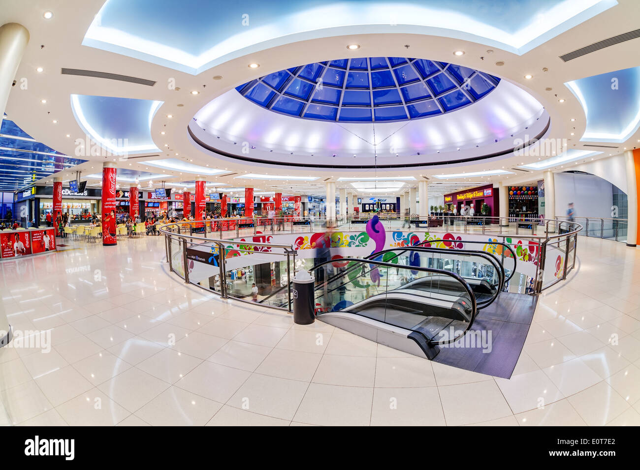 interior of shopping mall with people walking Stock Photo - Alamy