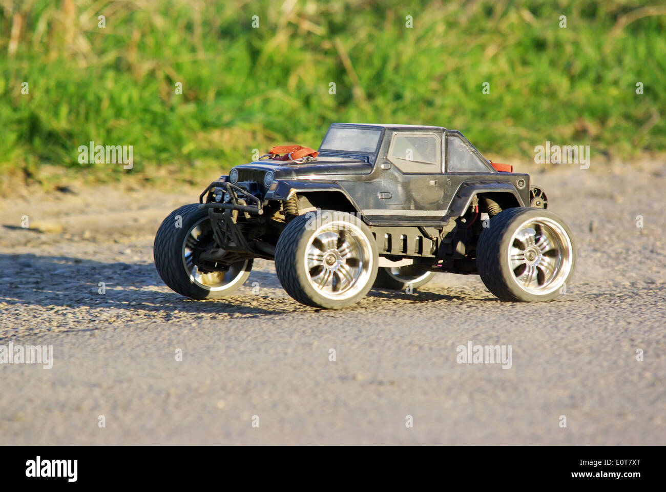 Electric off-road car, radio controlled model on the ground Stock Photo ...