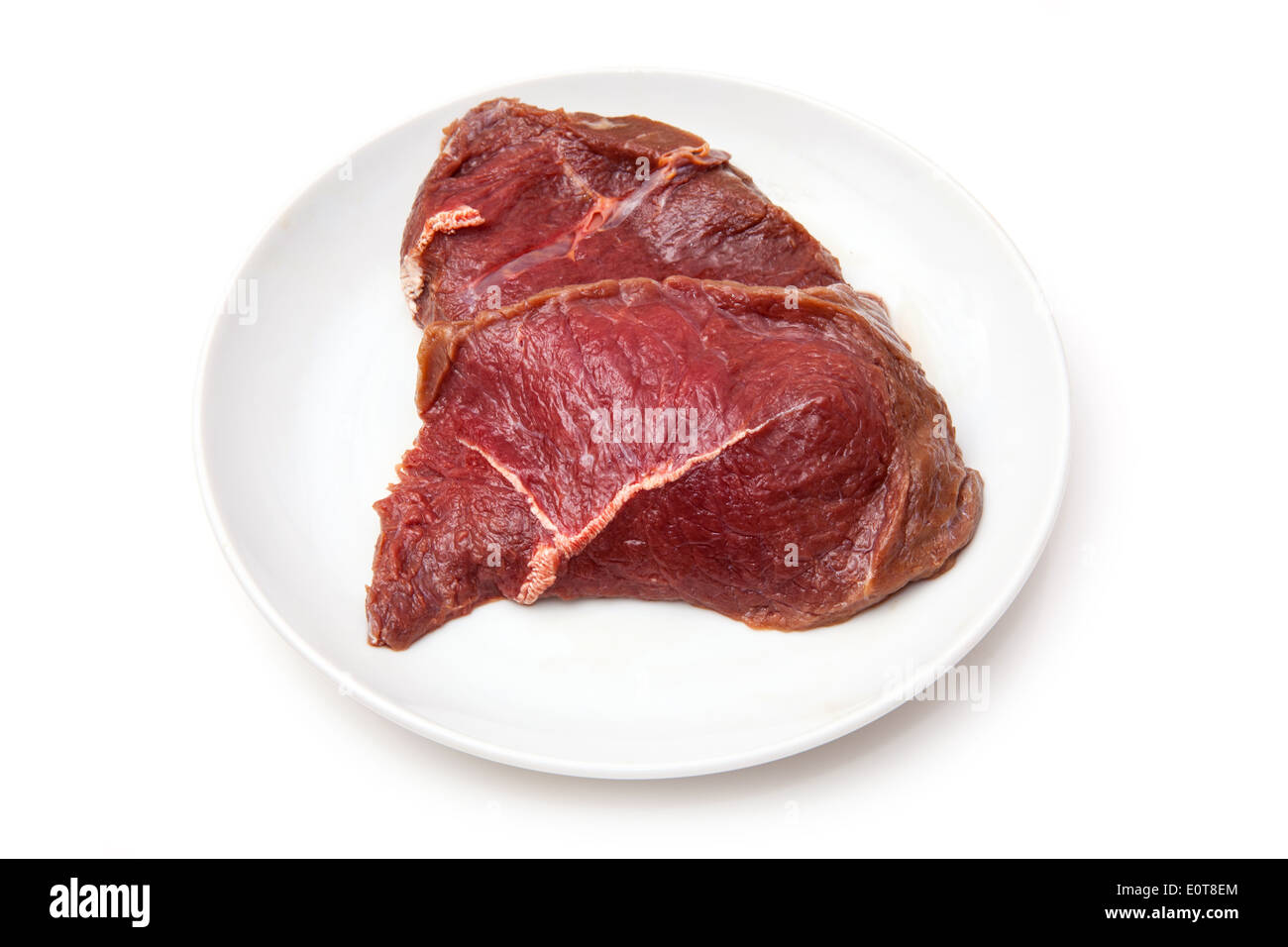Fresh horse meat steak isolated on a white studio background Stock ...