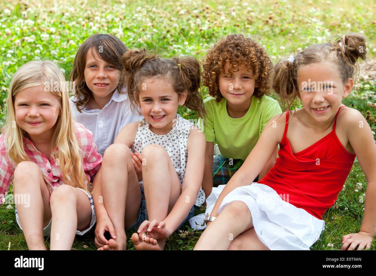 Cute children playing together hi-res stock photography and images - Alamy
