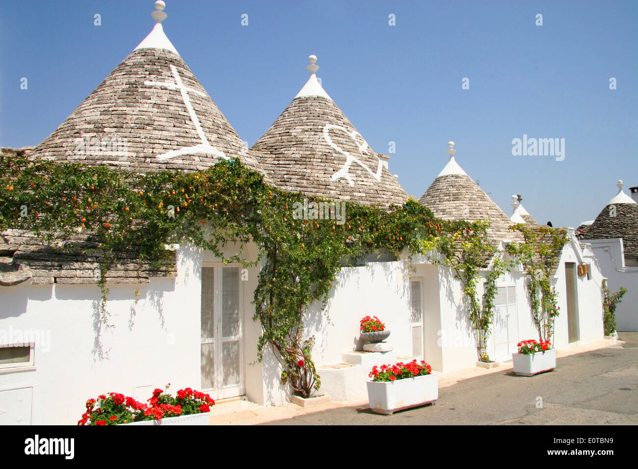 Trulli houses in the center of Alberobello, Puglia, Italy Stock Photo ...