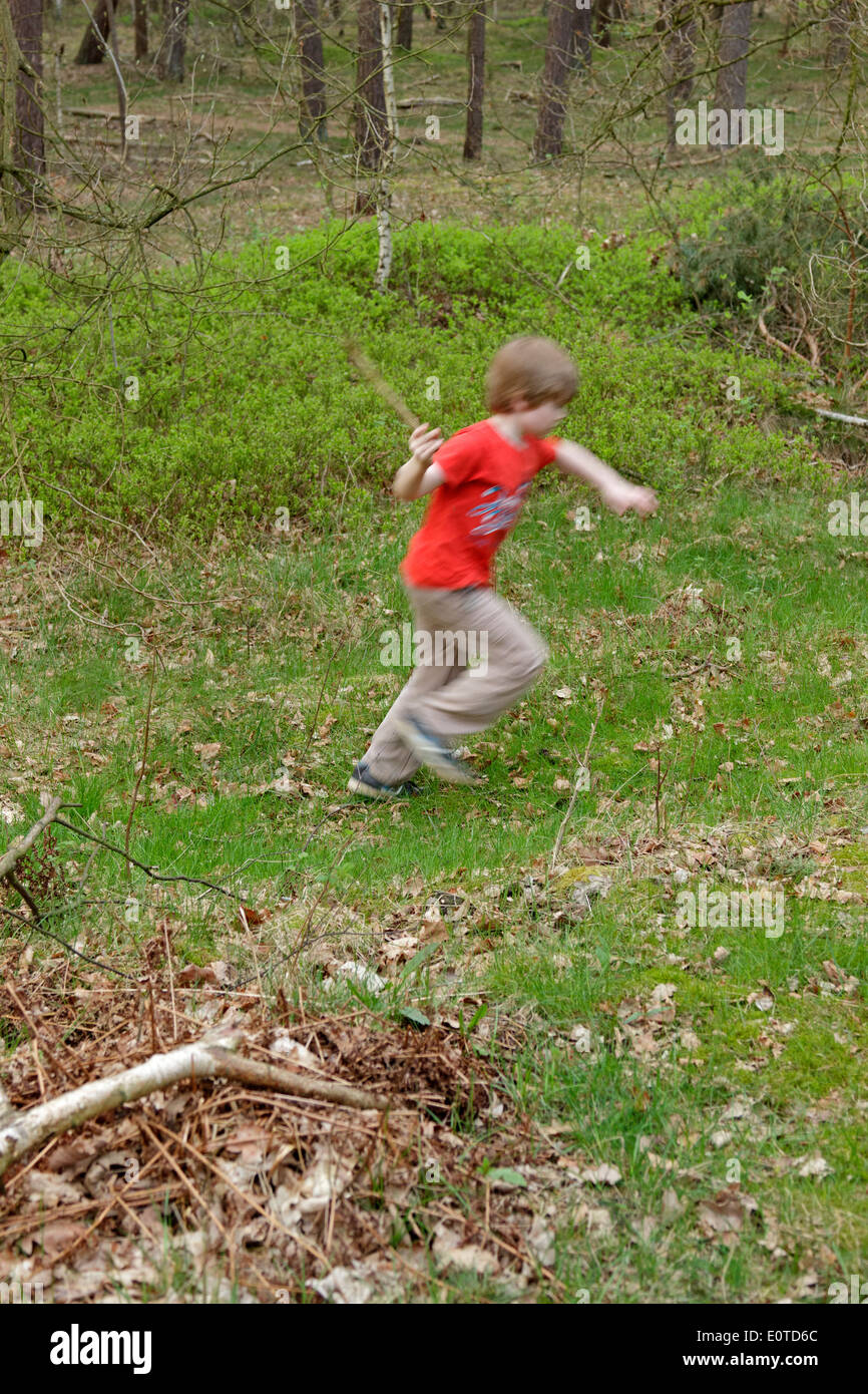 young boy running Stock Photo - Alamy