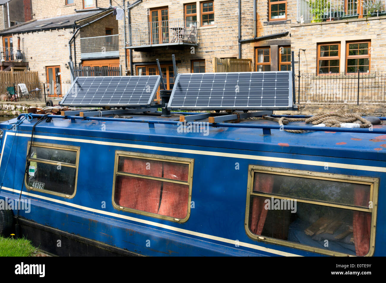 Solar panels on top of a narrowboat in Yorkshire Stock Photo - Alamy