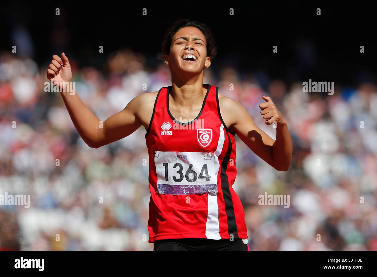 Neda Bahi of Tunisia celebrates winning gold following the women's 400m ...