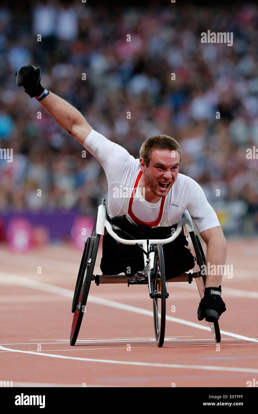 Mickey Bushell of Great Britain celebrates winning gold following the ...