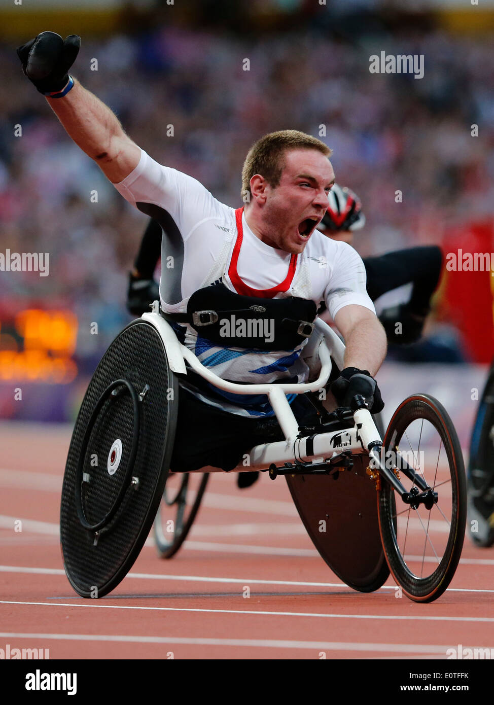 Mickey Bushell of Great Britain celebrates winning gold following the ...