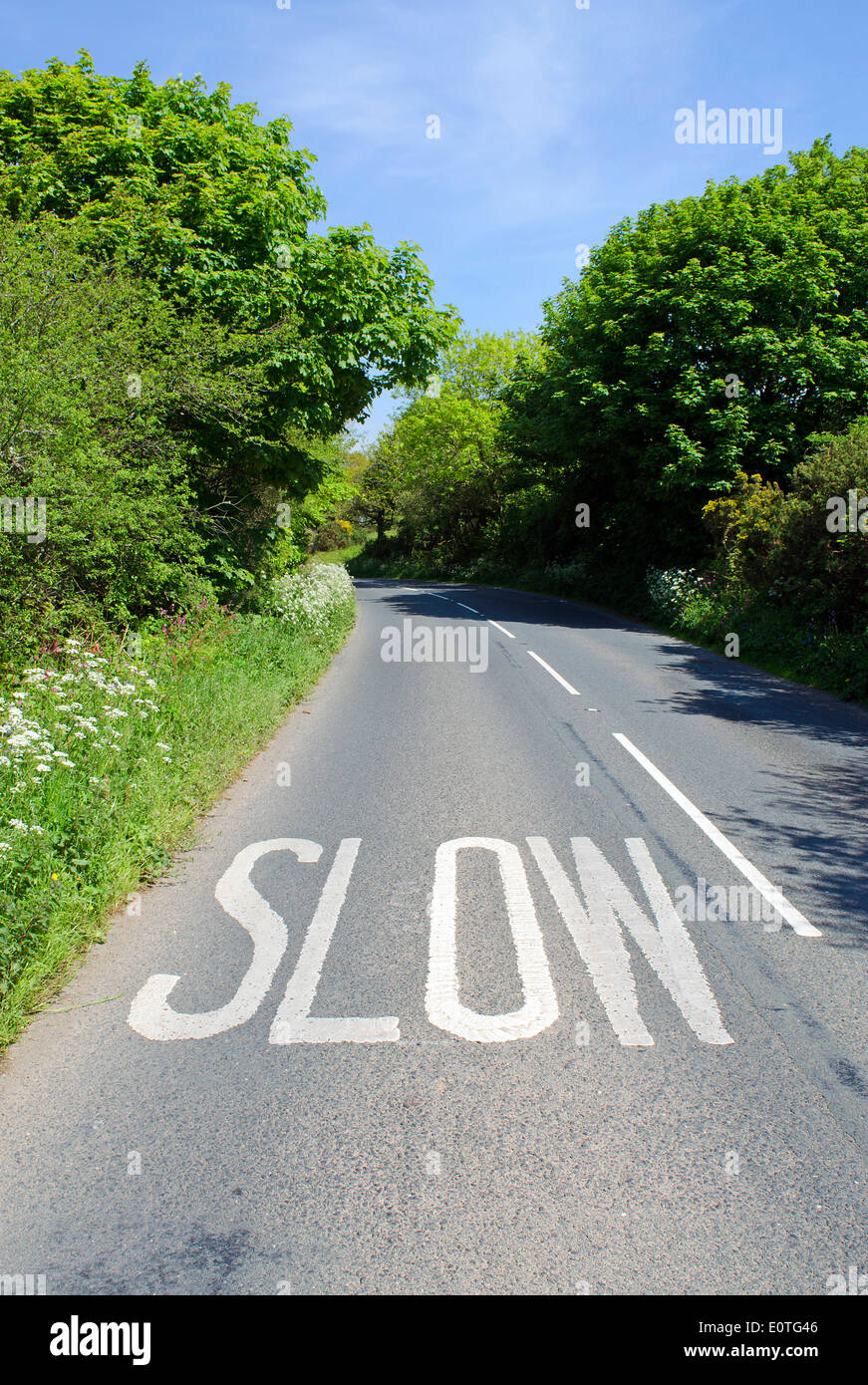 Slow down road sign hi-res stock photography and images - Alamy