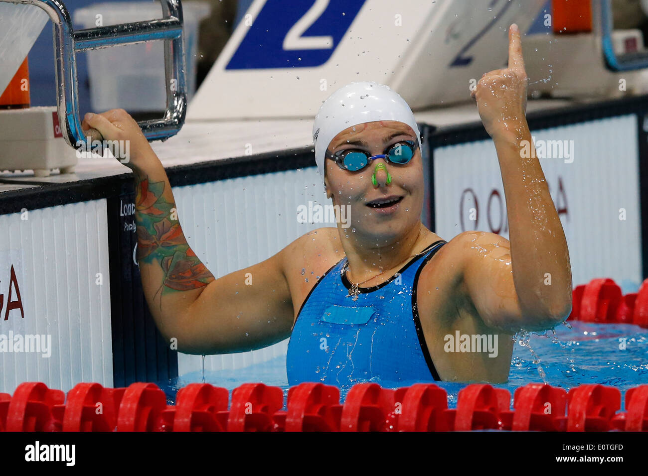 Oxana Savchenko of Russia celebrates winning gold following the women's ...