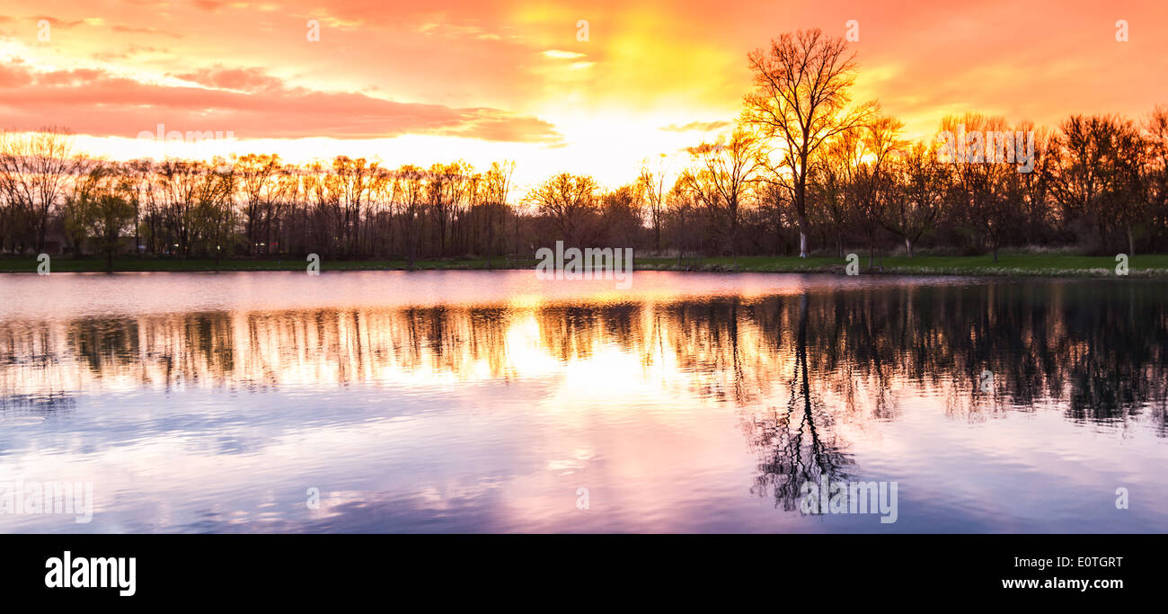 beautiful sunset with a reflection over a small lake in Illinois Stock ...