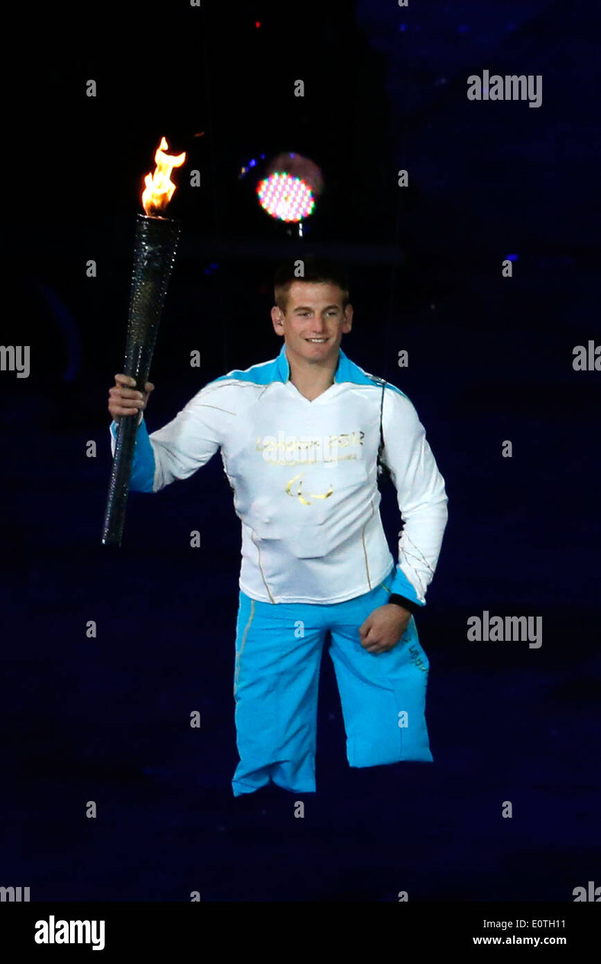 Joe Townsend arrives with the Paralympic torch flame in the Olympic ...