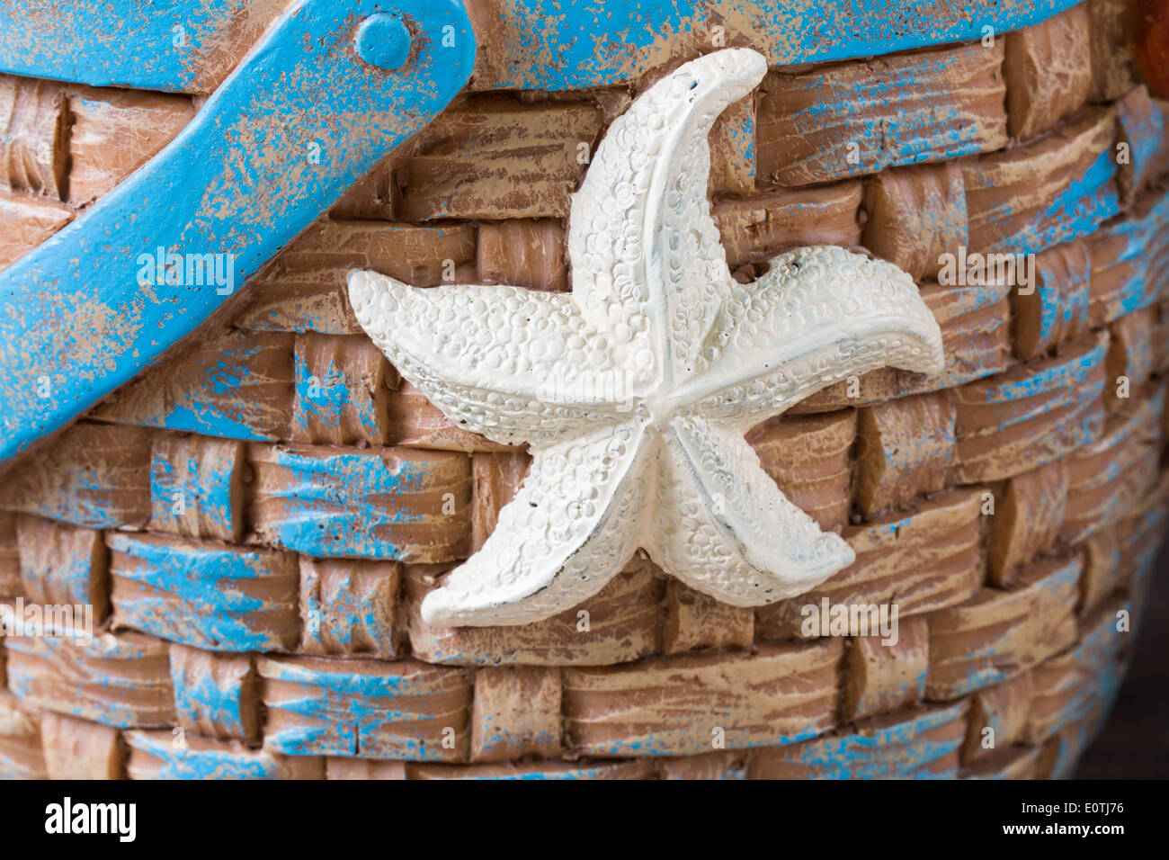 Starfish on a wicker basket Stock Photo - Alamy