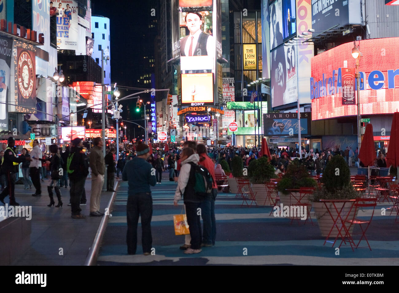 Regular people transit in Times Square and Broadway in New York City ...