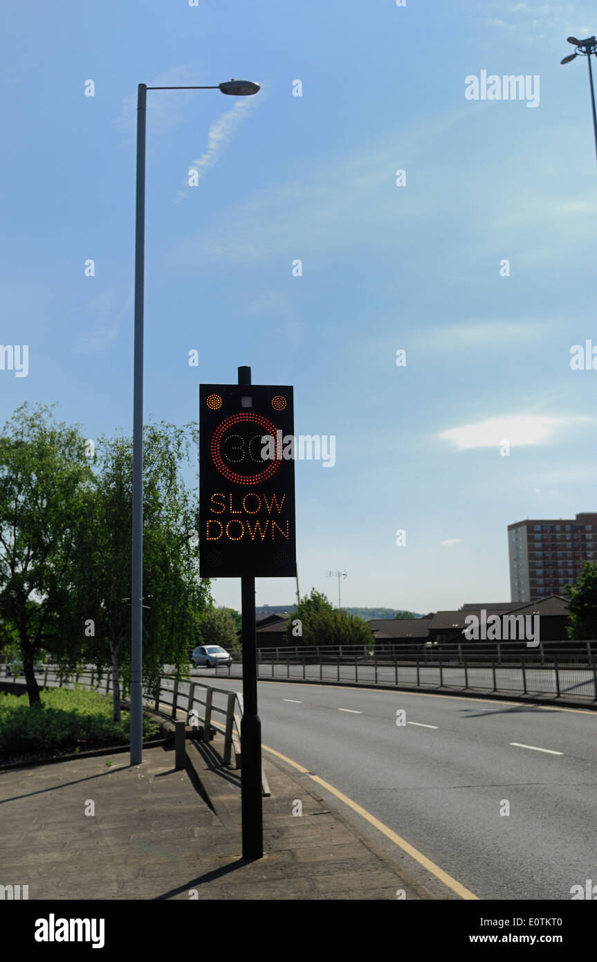 Slow Down traffic control board by dual carriageway in Luton Stock ...