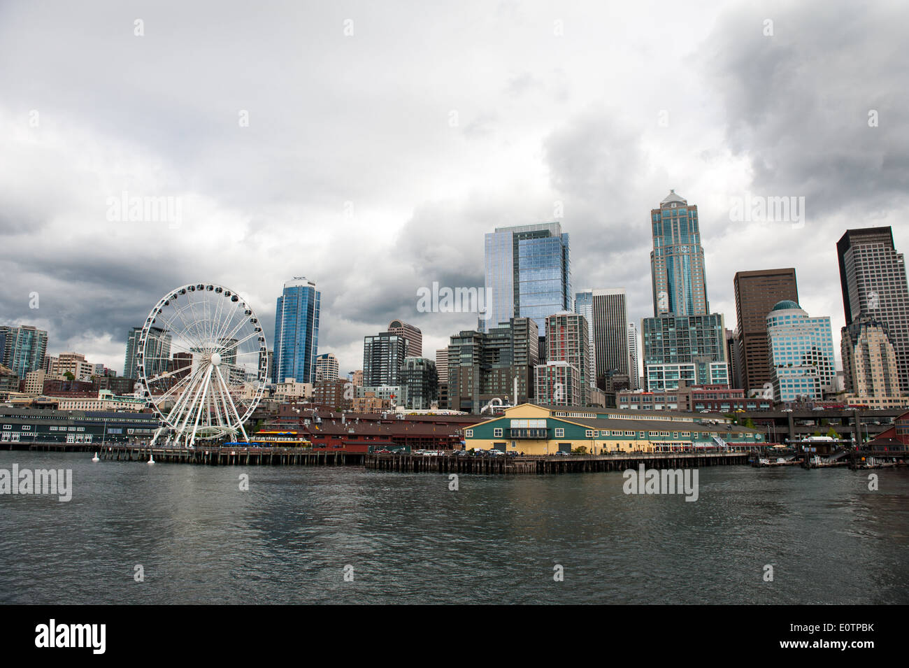 A view of the Seattle Great Wheel, Pier 57, and Seattle skyline seen ...