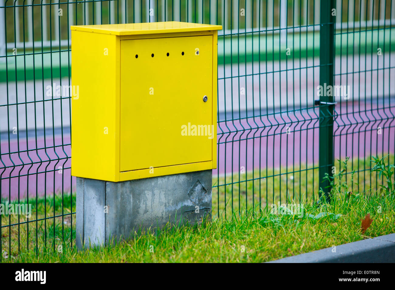 Yellow electric control box outdoor. Urban power and energy. Supply ...