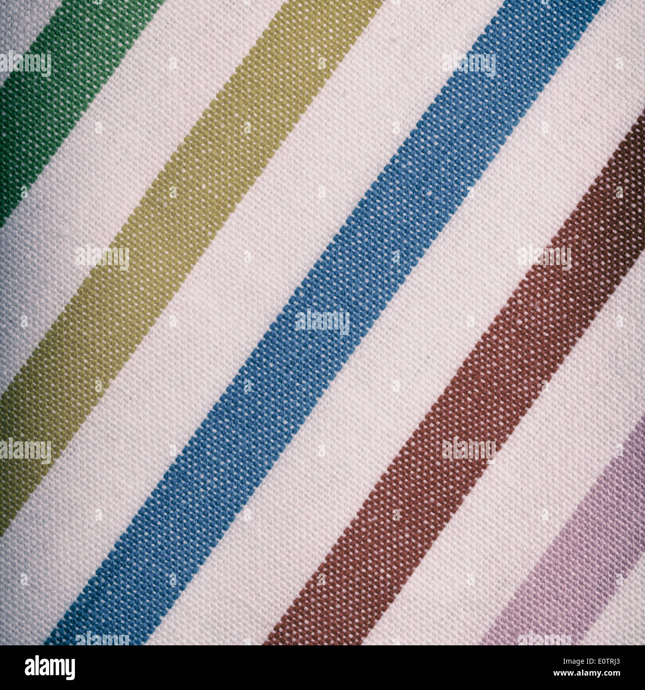 Closeup of colorful diagonal striped fabric textile as background ...