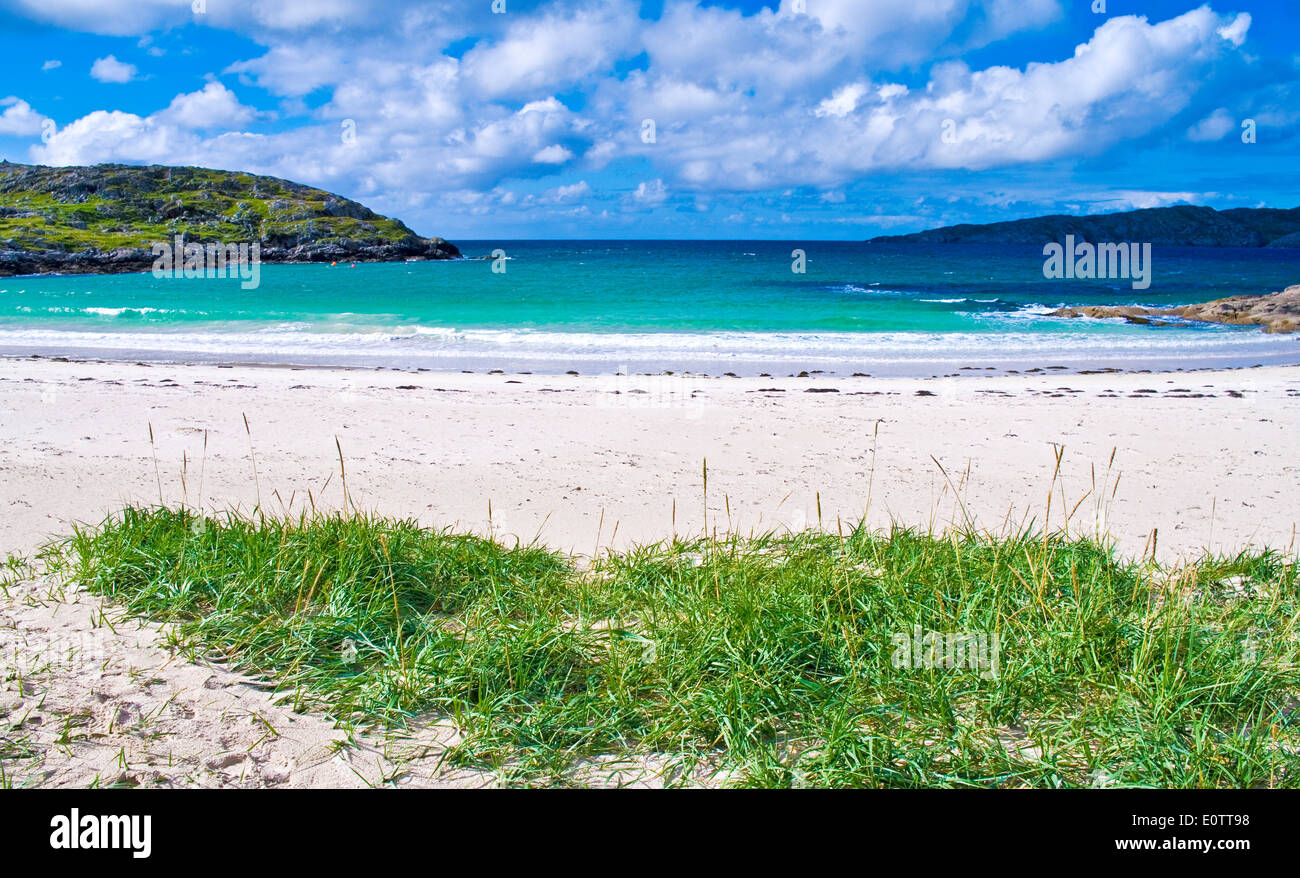 Deep blue sea and white sand beach, Achmelvich bay near Lochinver ...